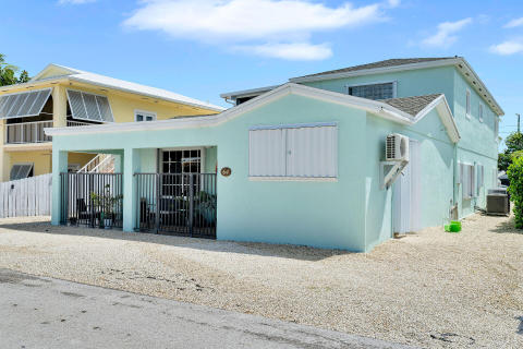 64 Coconut Drive, KEY LARGO, FL 33037.