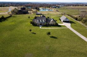 992 Anna Cade Road , Rockwall, TX 75087.