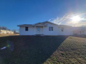 128 N 5th Street , McLoud, OK 74851.