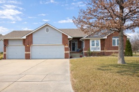 325 S Chippers Ct , Andover, KS 67002.